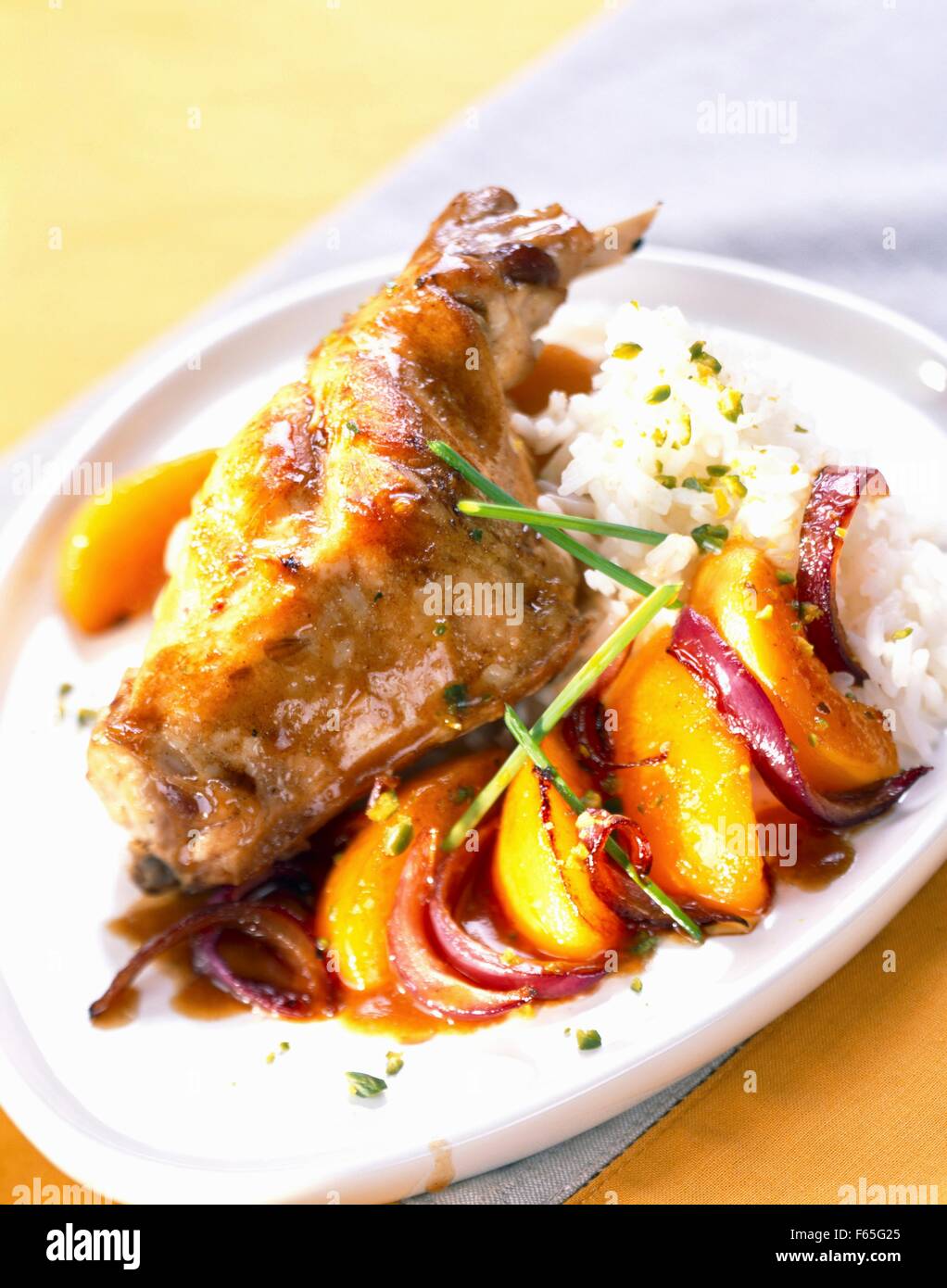 Rabbit with peaches Stock Photo - Alamy