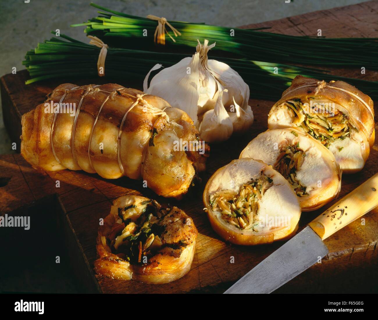 Saddle of rabbit stuffed with almonds and herbs Stock Photo - Alamy