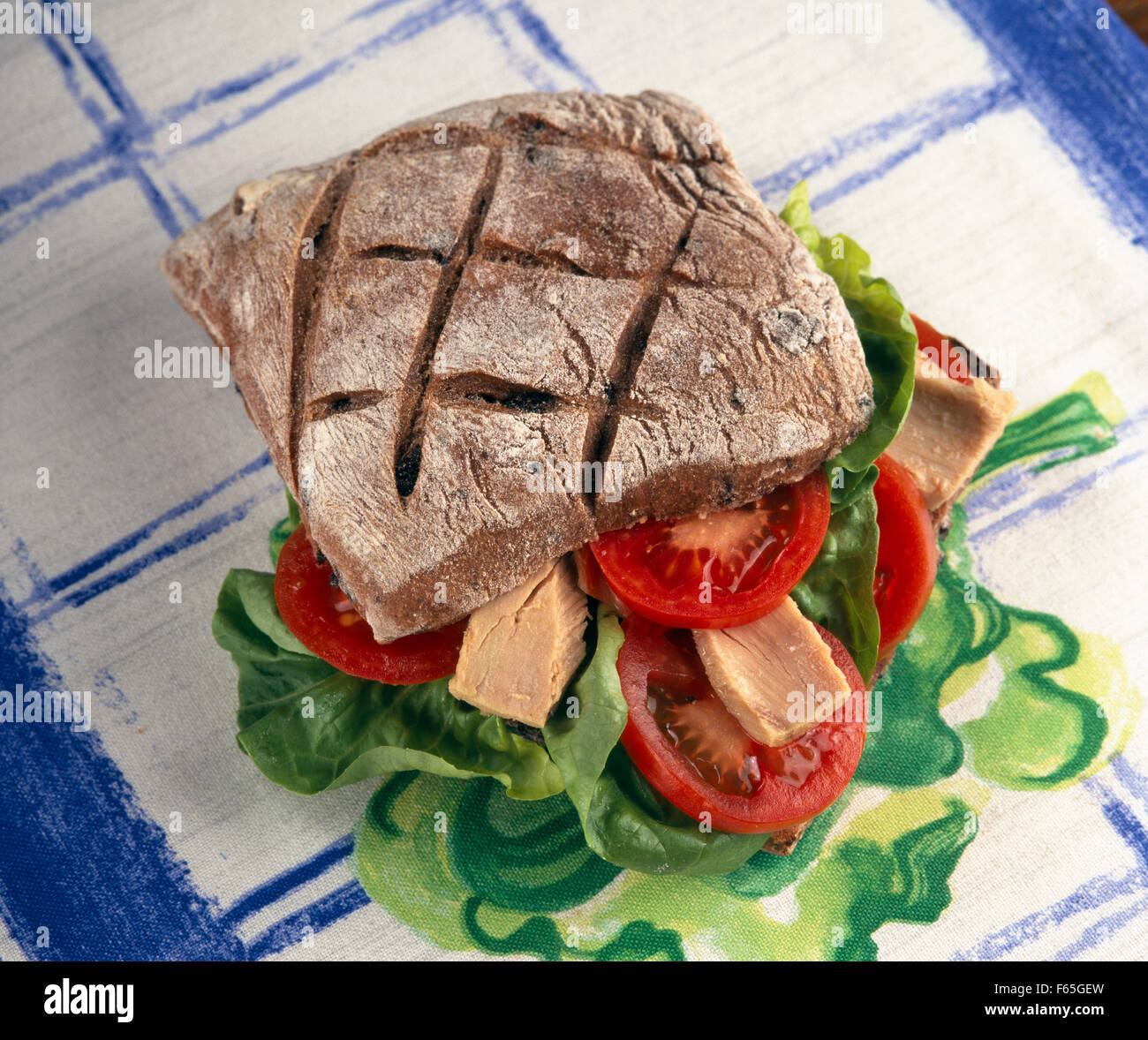 Tomato,tuna and lettuce olive bread sandwich Stock Photo - Alamy