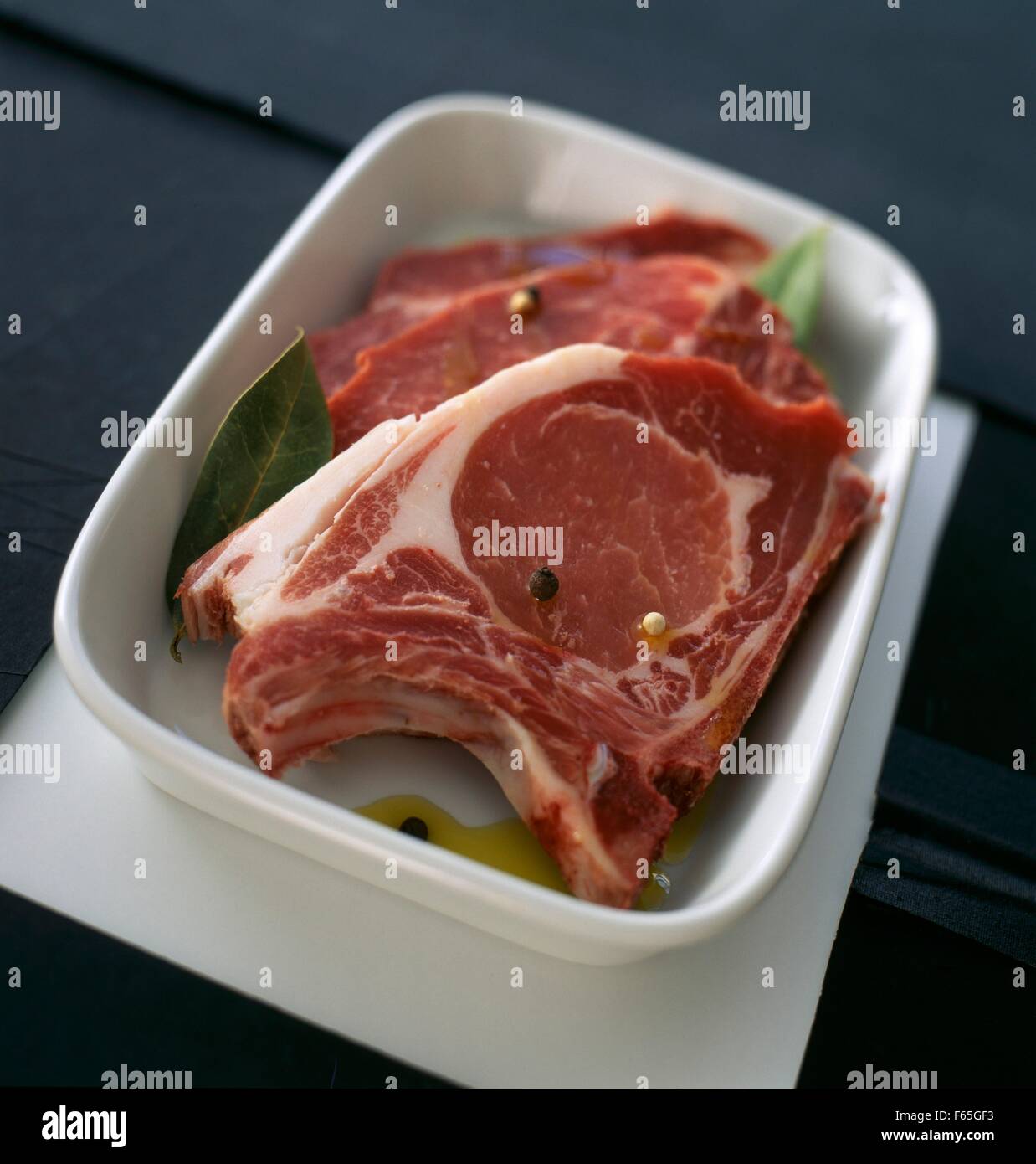 Raw pork backbone Stock Photo - Alamy