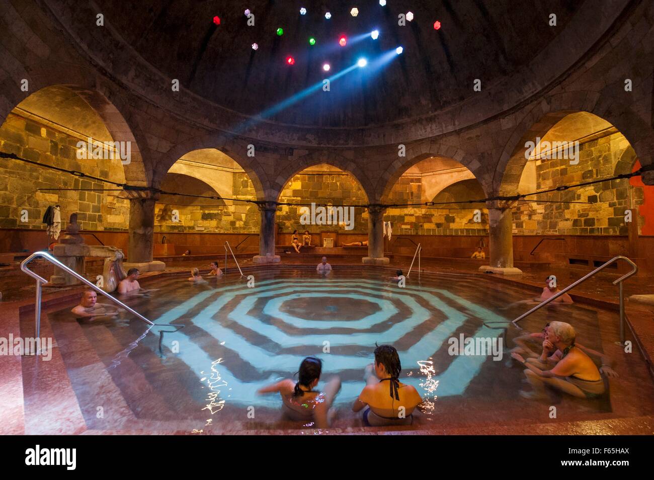 The octagonal pool surrounded by pointed arches in the Rudas Bath ...