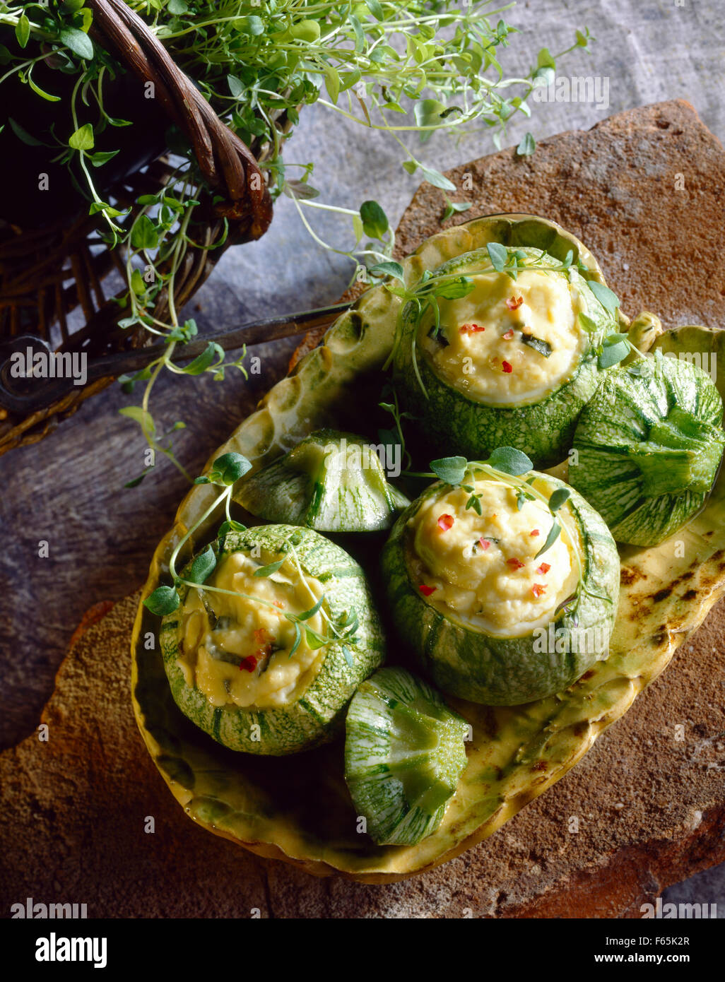 Round zucchinis stuffed with Brousse cheese Stock Photo - Alamy