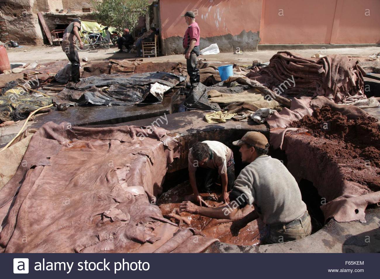 Workers tanning animal hides in the Tanner's Quarter north of the Stock ...