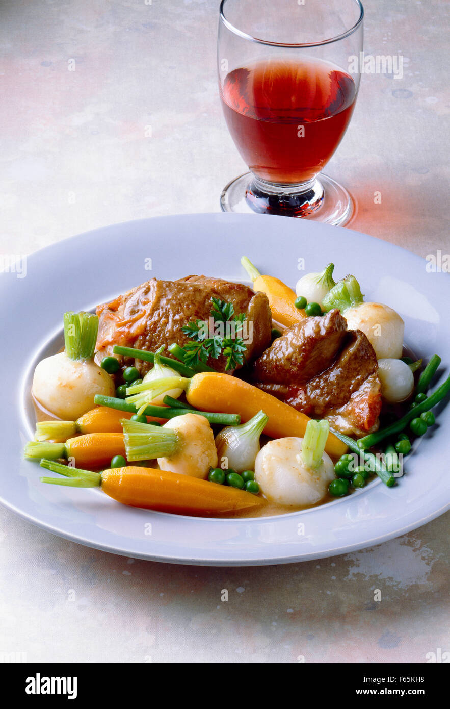 Lamb Navarin with spring vegetables Stock Photo - Alamy