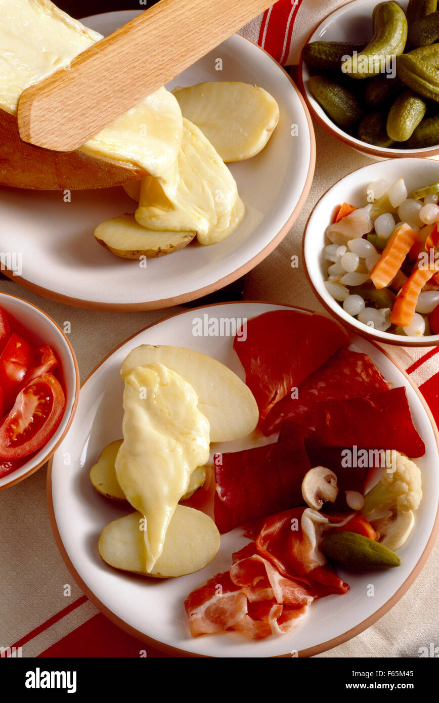 Raclette and cold cuts Stock Photo - Alamy