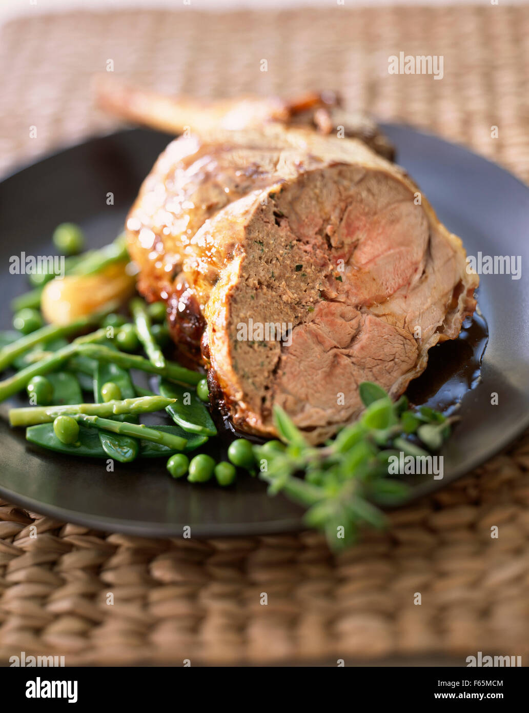 Leg of young goat roast Stock Photo - Alamy