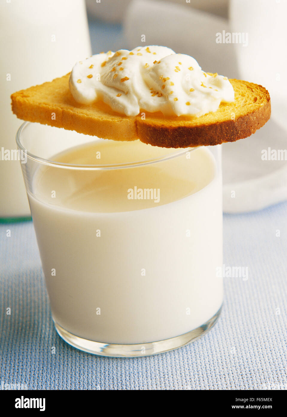 milk and cheese spread on bread Stock Photo - Alamy