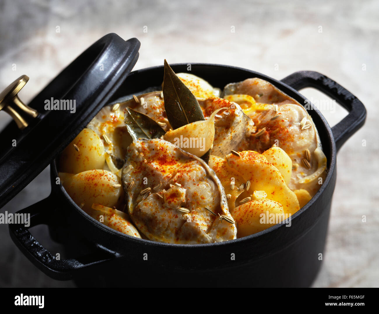 Pollack bourride in a casserole dish Stock Photo - Alamy