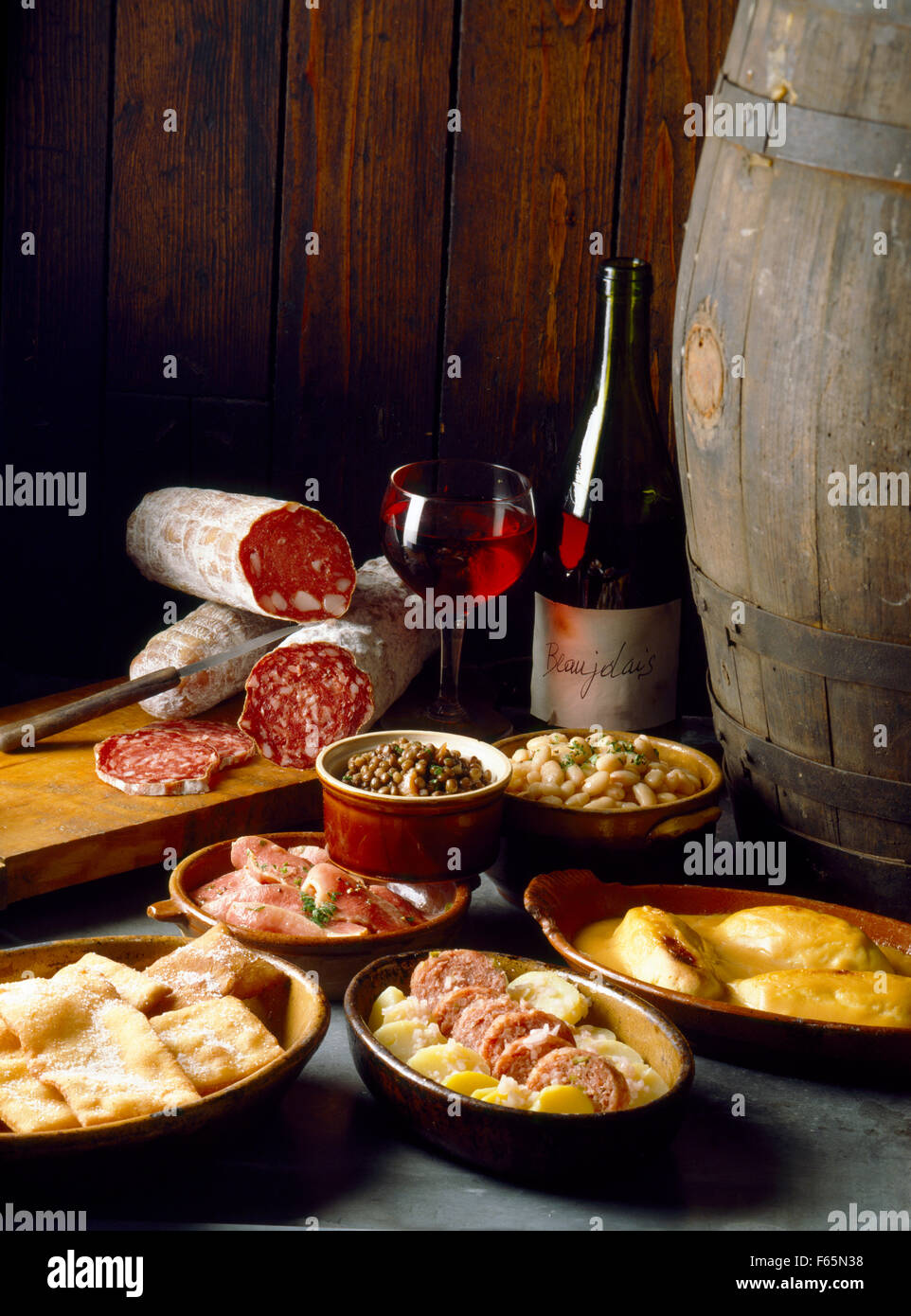 Traditional dishes from Lyon,wine and barrel Stock Photo - Alamy