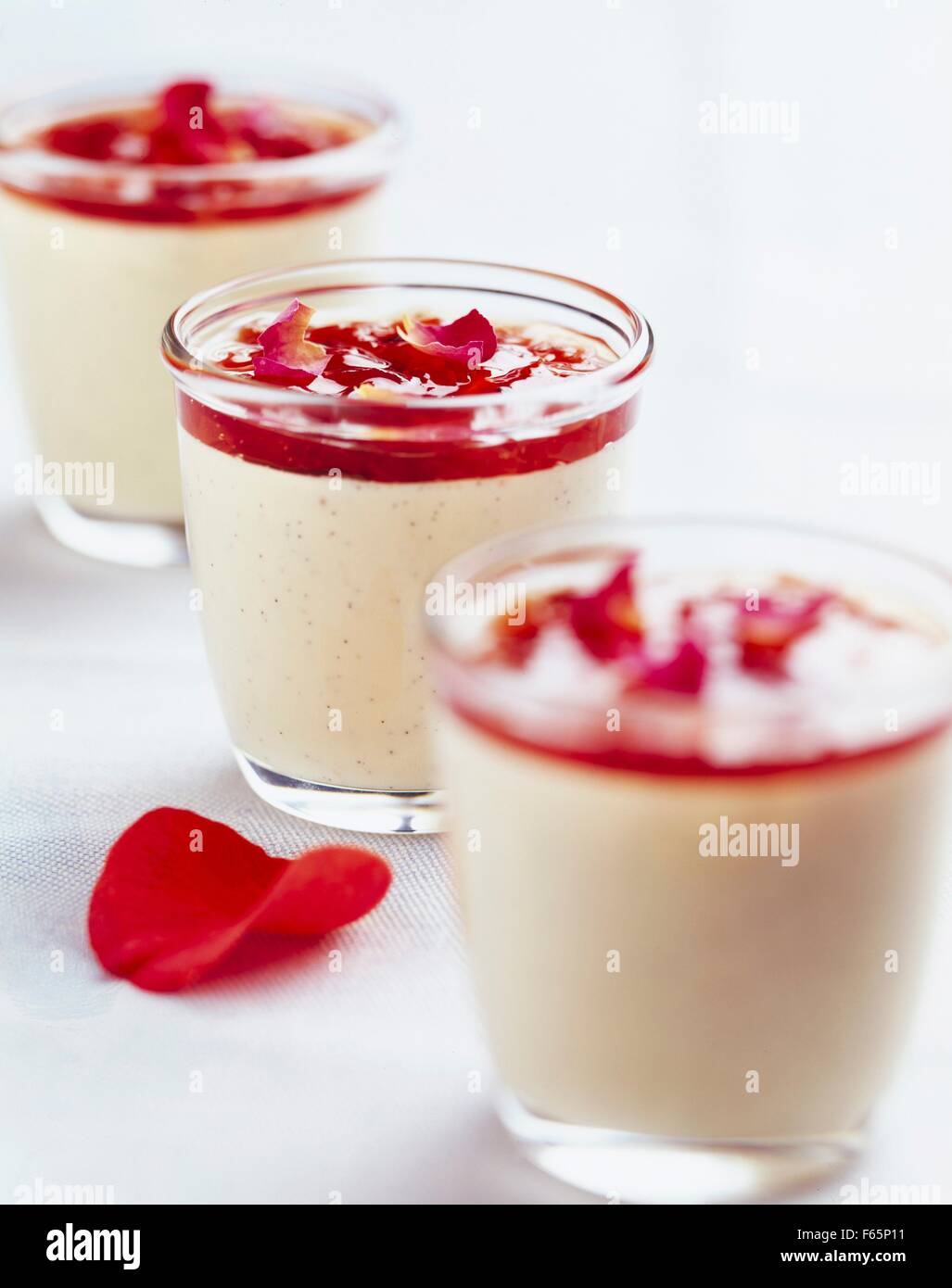 Vanilla cream dessert with rose petals Stock Photo - Alamy