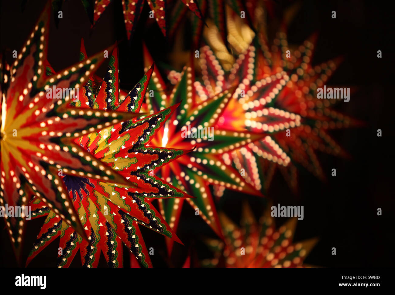 Traditional star shaped colorful lanterns lit up on the occasion of ...