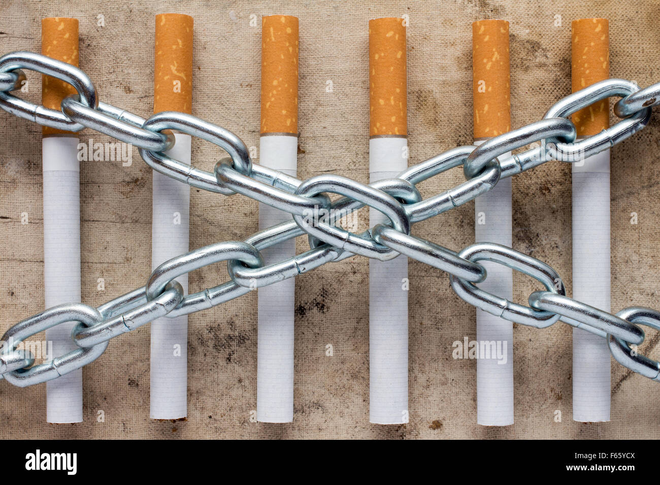 Chained cigarettes. Conceptual image for stop smoking Stock Photo - Alamy