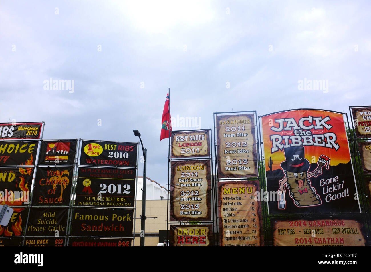 Menu signs above stall at the annual Rib Fest held in the Canadian city ...