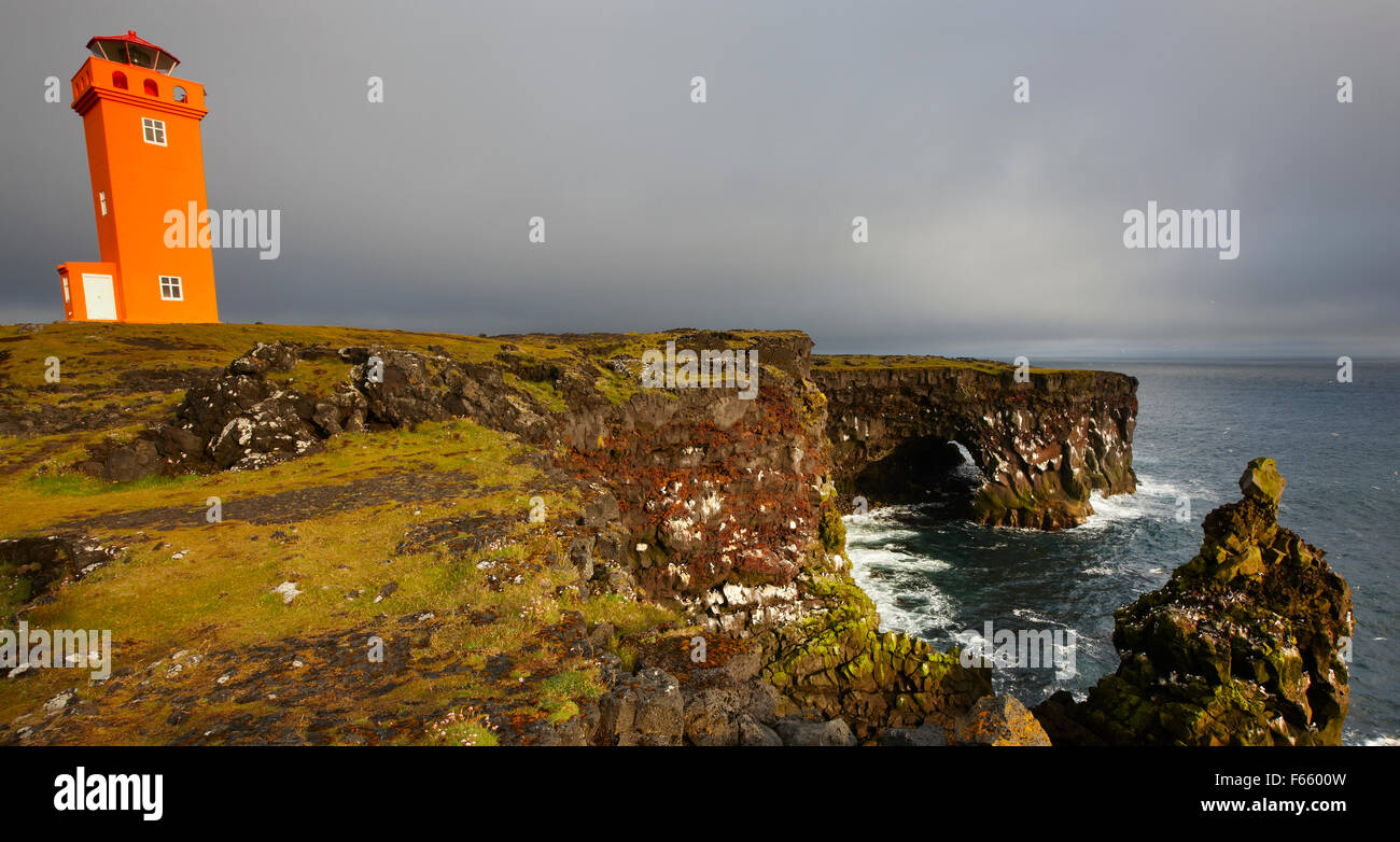 Orange lighthouse at Iceland sea coast in Snaefellnes Peninsula Stock ...