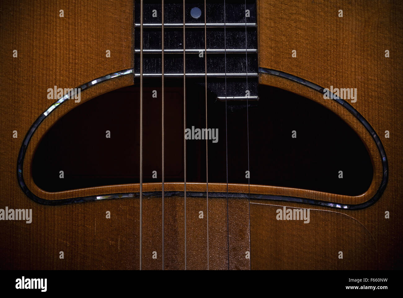 Details of a hole of an old gypsy acoustic guitar Stock Photo - Alamy