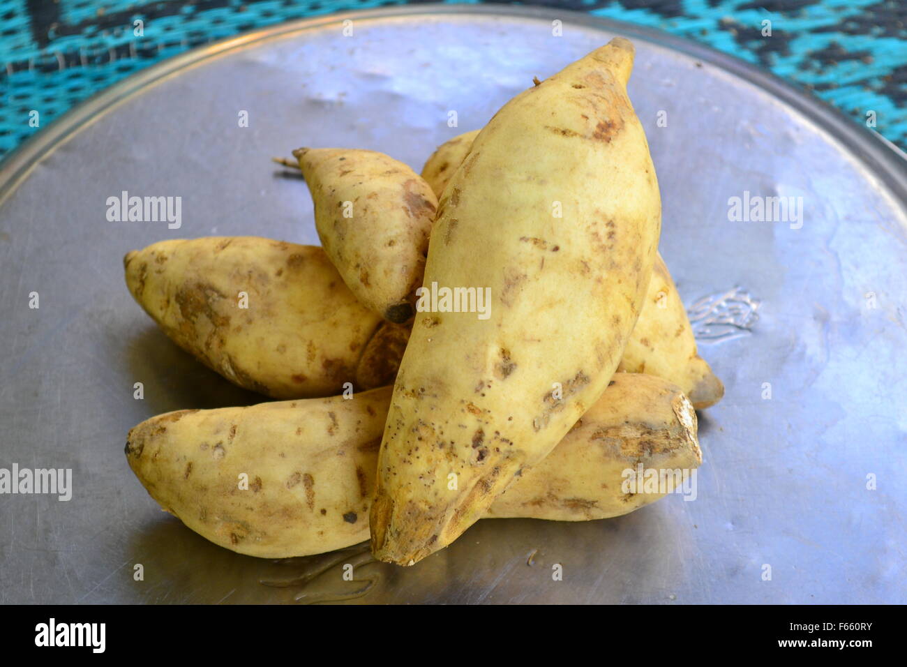 Sweet Potatoes raw with skin Stock Photo - Alamy