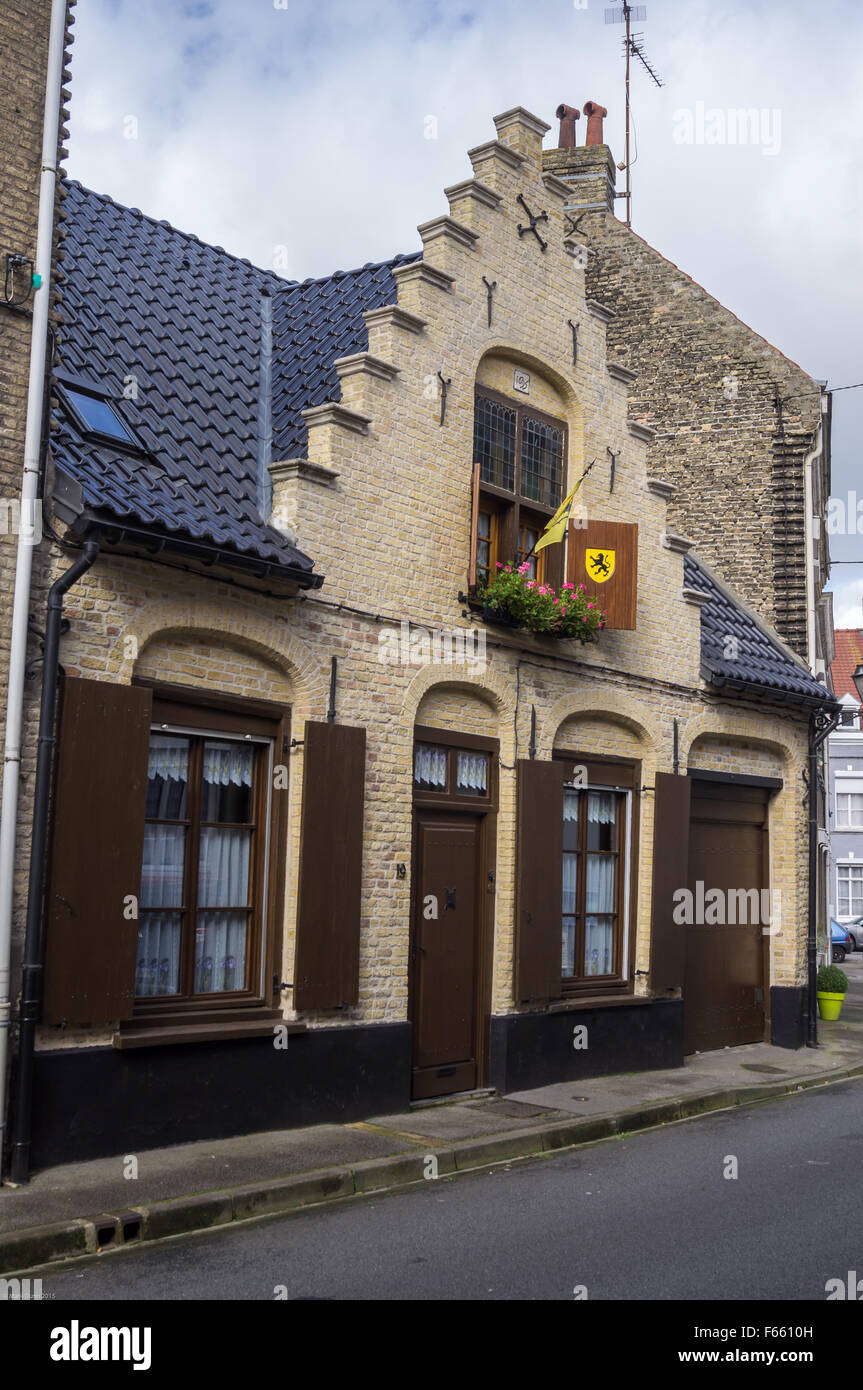 Traditional Flemish terraced Dutch gabled house showing the arms of ...