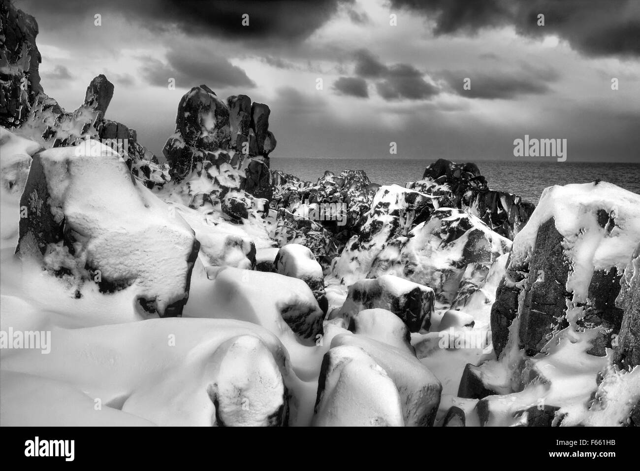 Rocky coast during a bad weather. (Commander Islands Stock Photo - Alamy