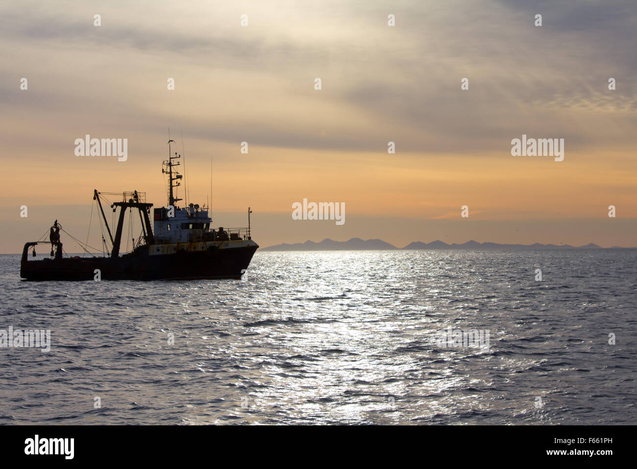 Fishing trawler during a storm in Pacific ocean near Commander Islands ...