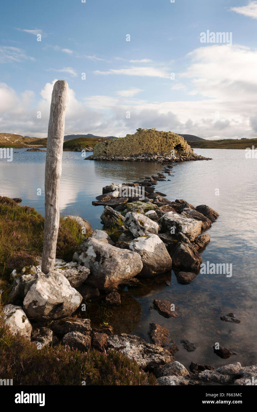 Stone causeway leading to Dun Baravat Iron Age galleried dun or broch ...