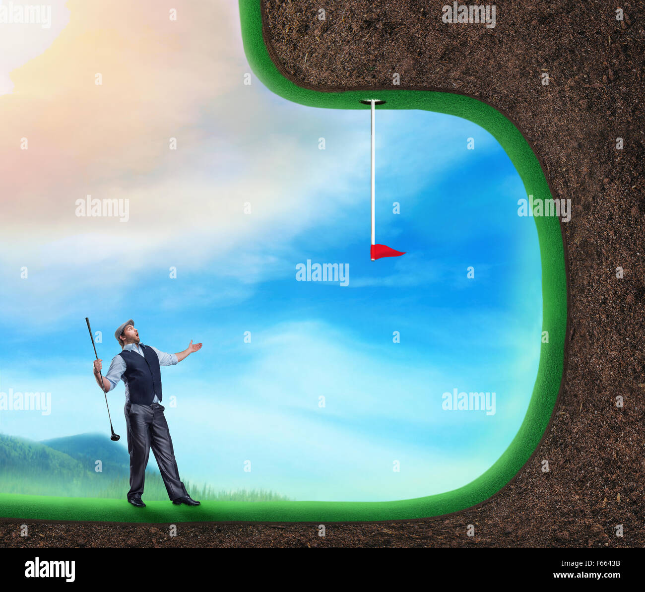 Businessman playing strange golf in open air Stock Photo - Alamy
