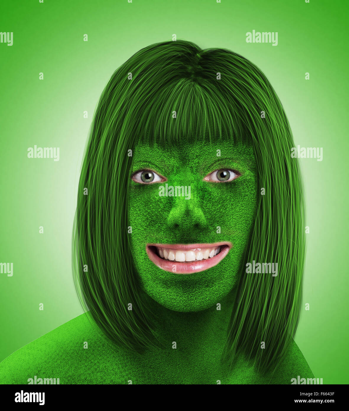 Female grass head on green background Stock Photo - Alamy