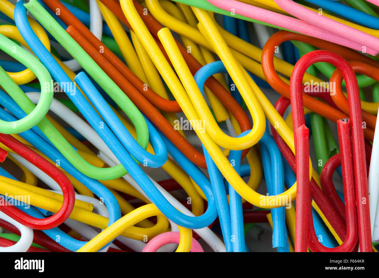 Many colorful paper clips. Background or texture Stock Photo - Alamy