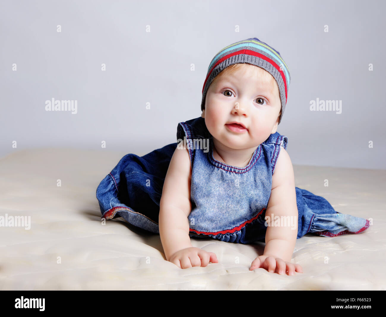 Little girl in color dress Stock Photo - Alamy