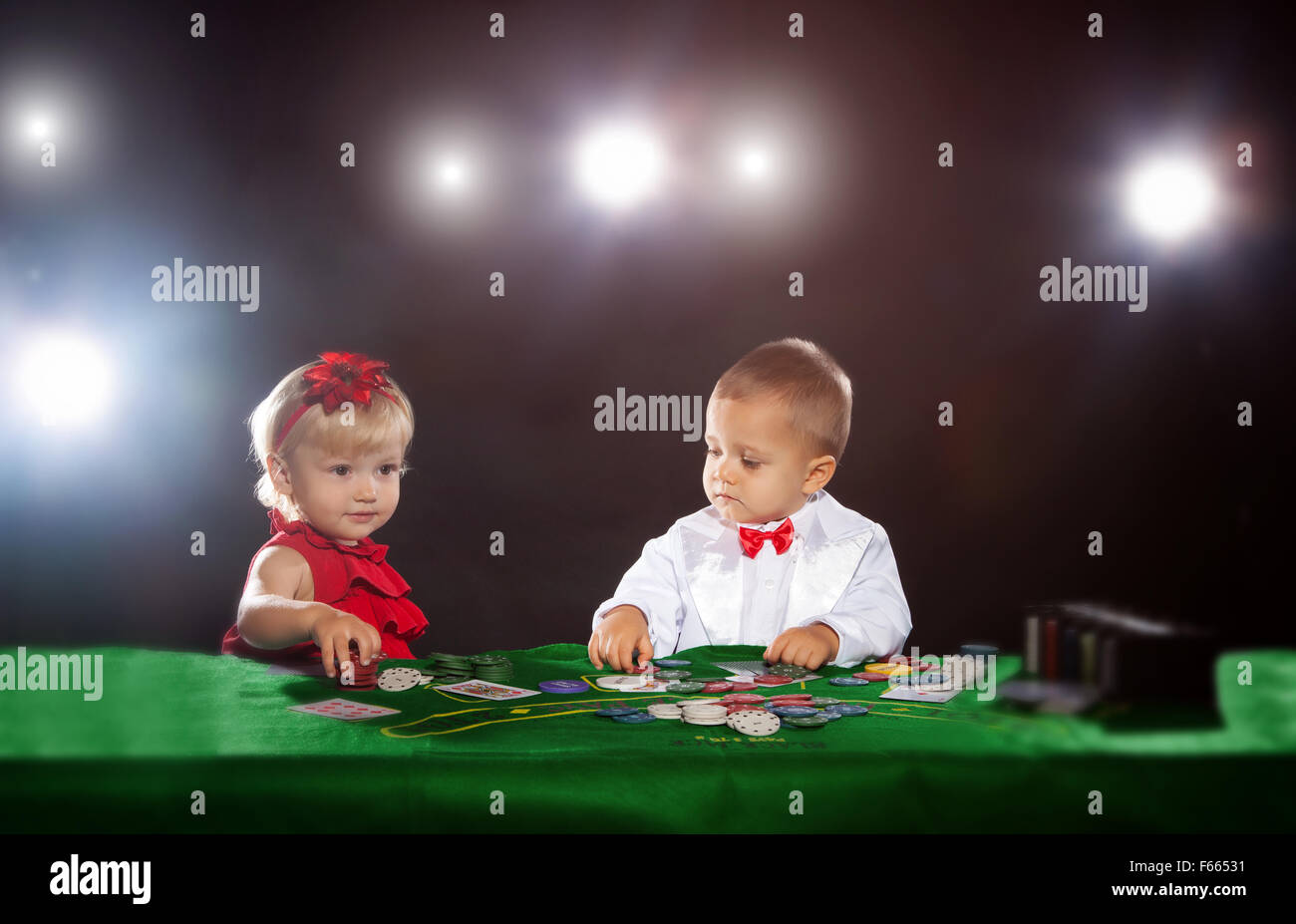 Boy and girl playing poker Stock Photo - Alamy