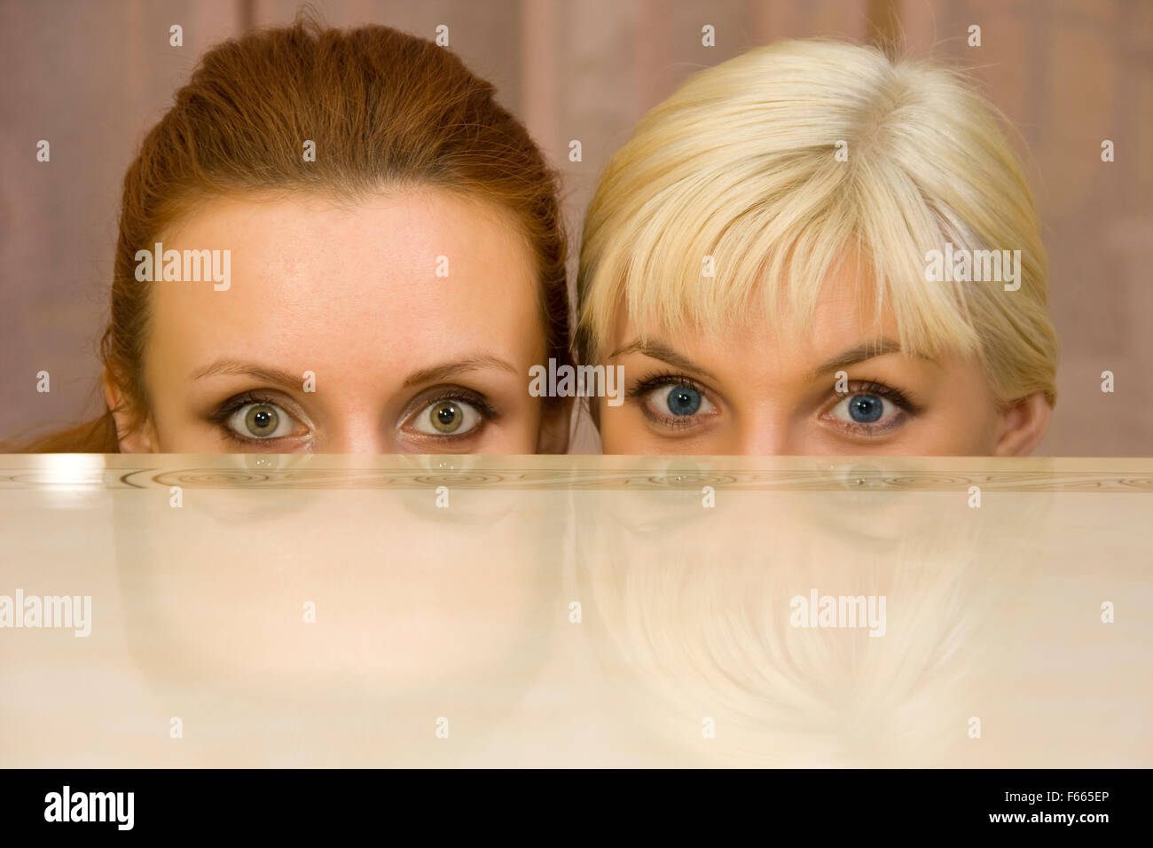 Two surprised woman Stock Photo - Alamy