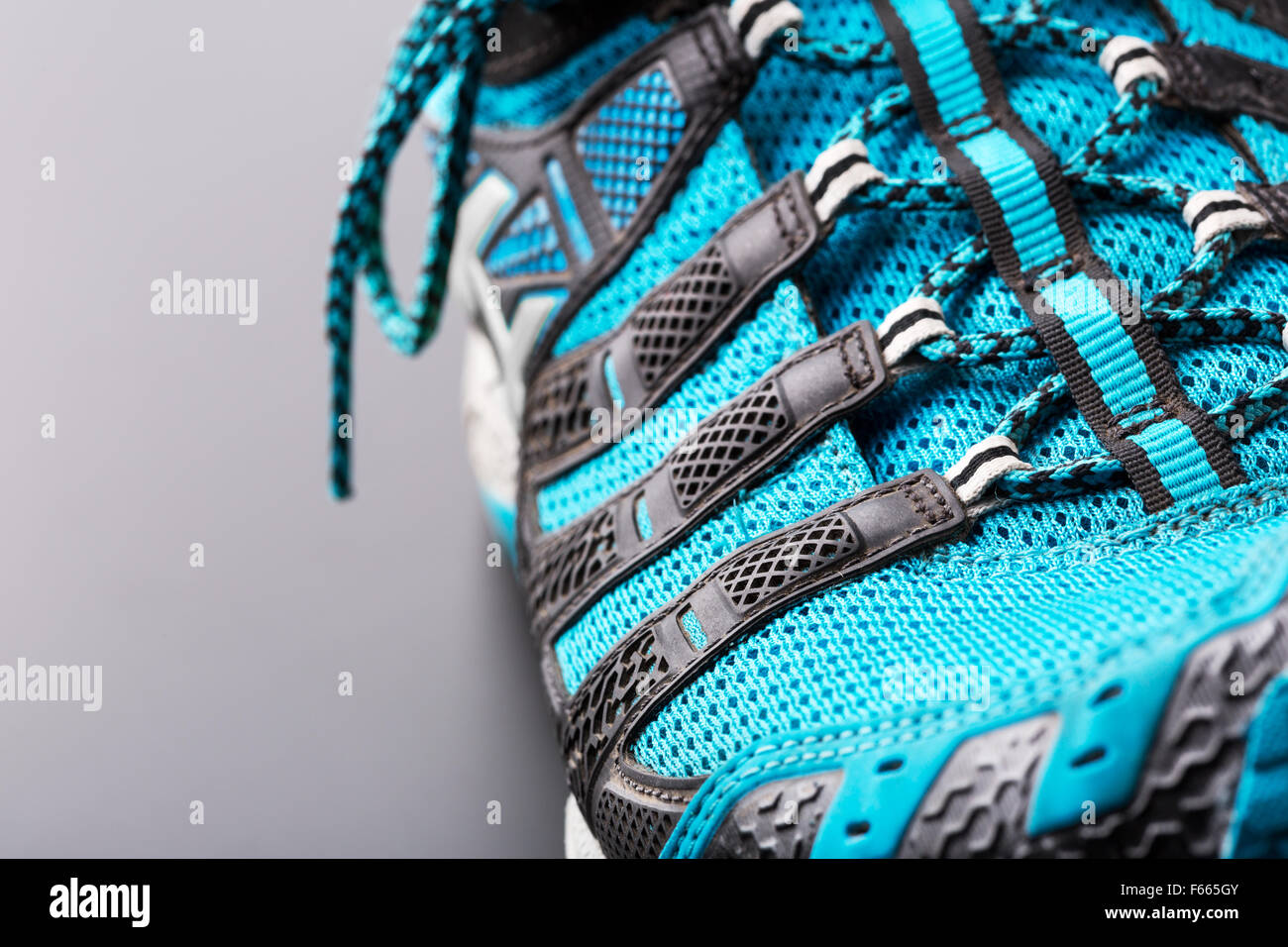 Closeup of blue running shoe Stock Photo - Alamy