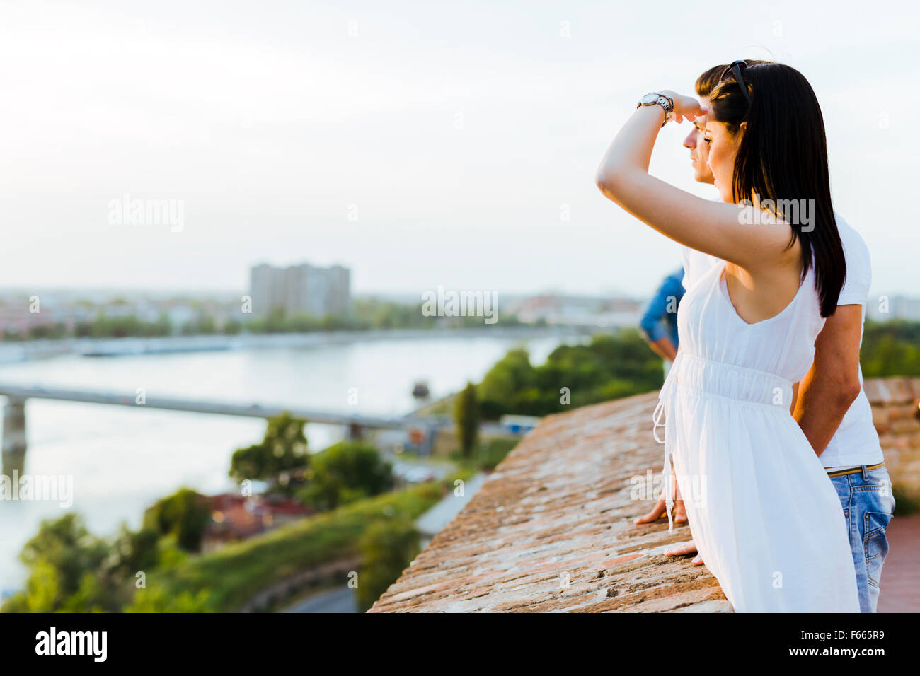 Man watching couple hugging hi-res stock photography and images - Alamy