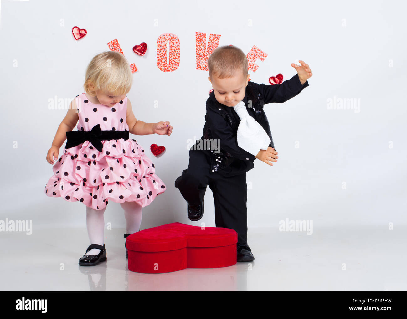 Little lovers in studio Stock Photo - Alamy