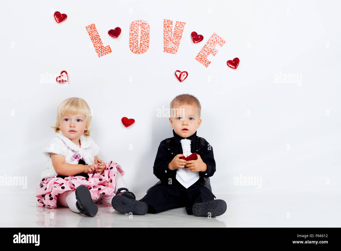 Little lovers in studio Stock Photo - Alamy