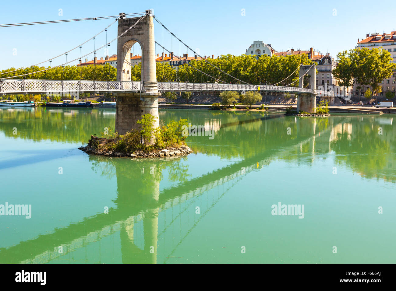 Old Passerelle du College bridge over Rhone river in Lyon, France ...