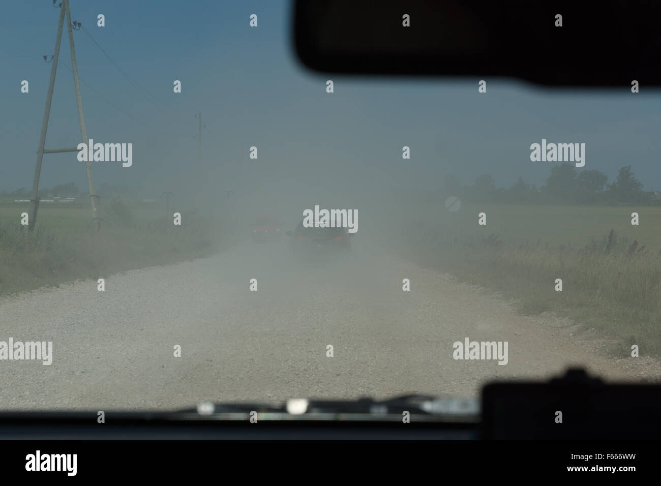 view of the dusty rural road from a car cabin Stock Photo - Alamy