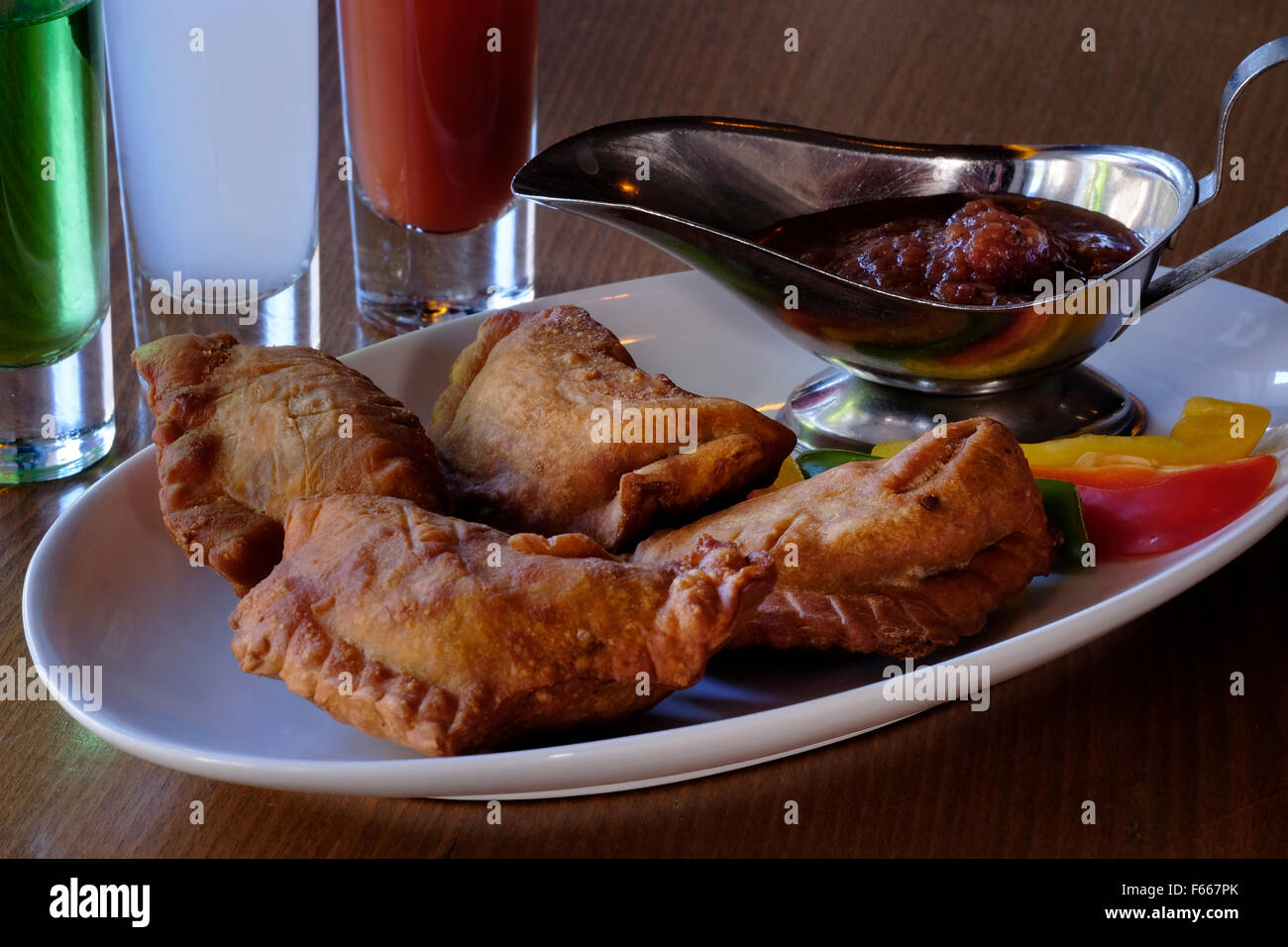 Traditional Latin-American-style stuffed pastry baked Empanadas served ...