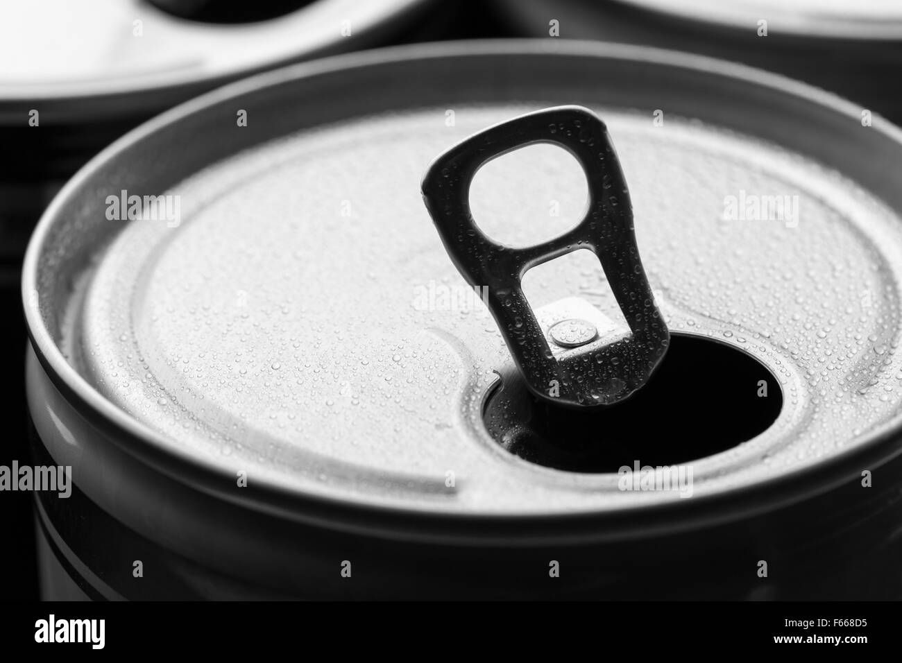 Two aluminum cans isolated on black Stock Photo - Alamy