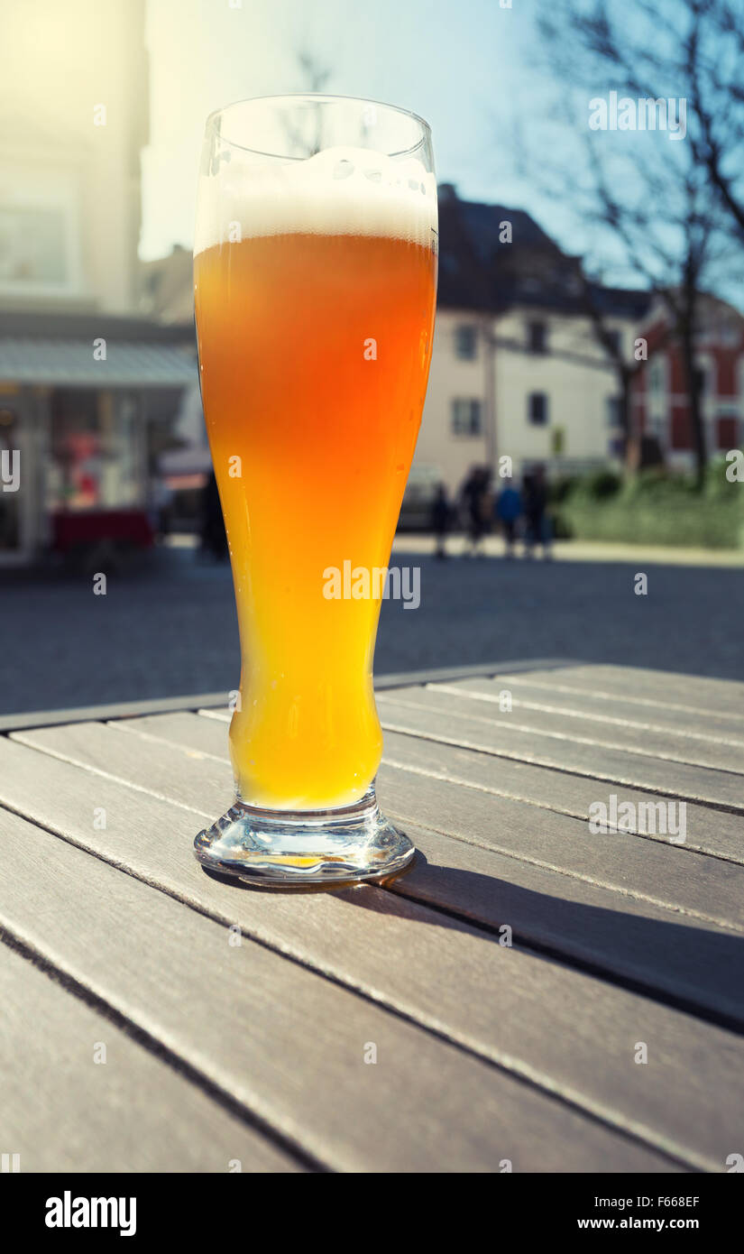 Glass of beer on an outdoor patio Stock Photo - Alamy