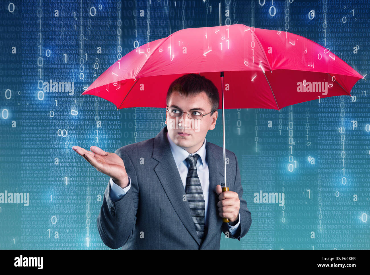 Office worker hiding under an umbrella from digital rain Stock Photo ...