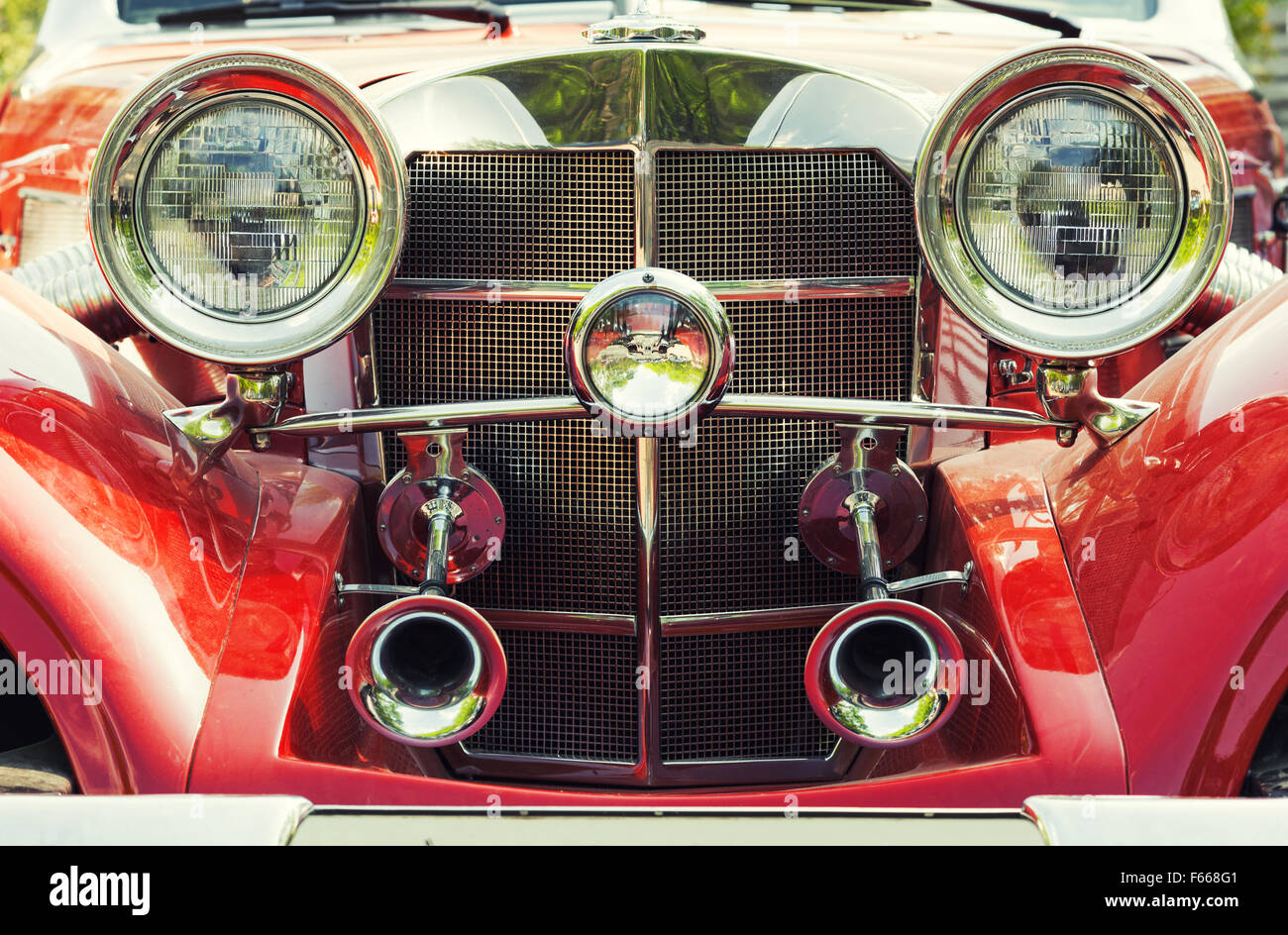 Front view of red retro car Stock Photo - Alamy