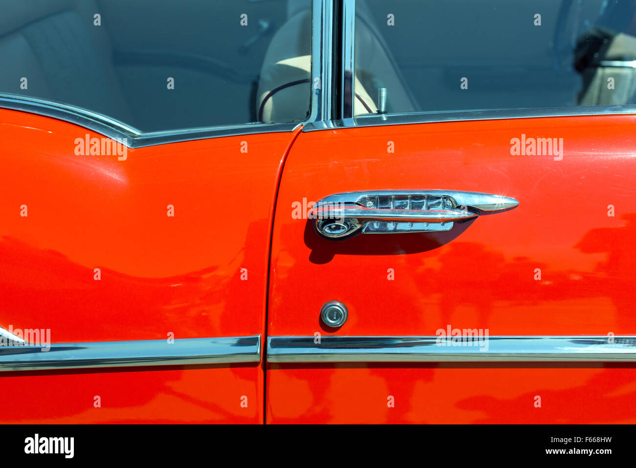 Door of red retro car Stock Photo - Alamy