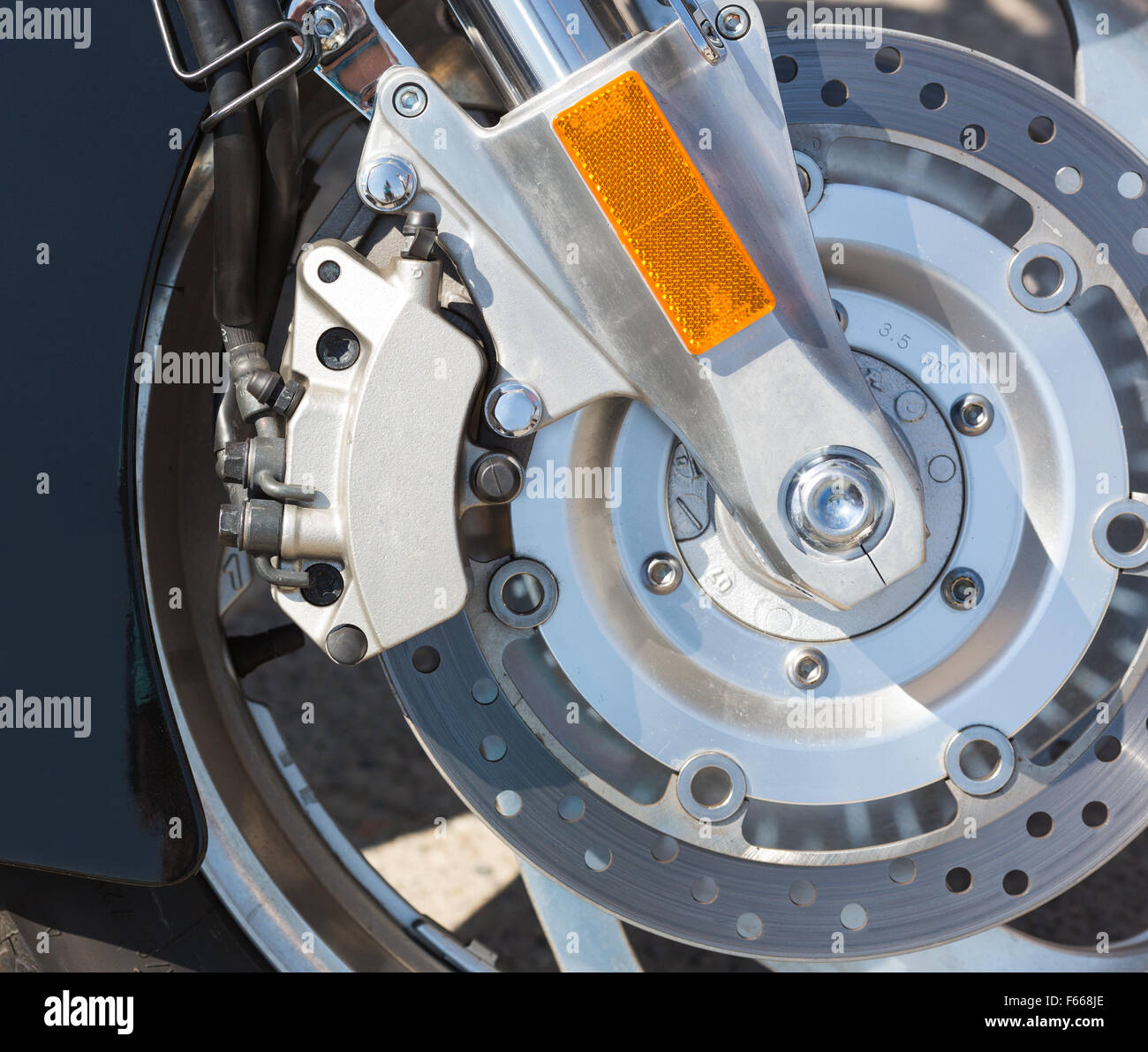 Detail of the front wheel of a motorcycle with disc brake Stock Photo ...