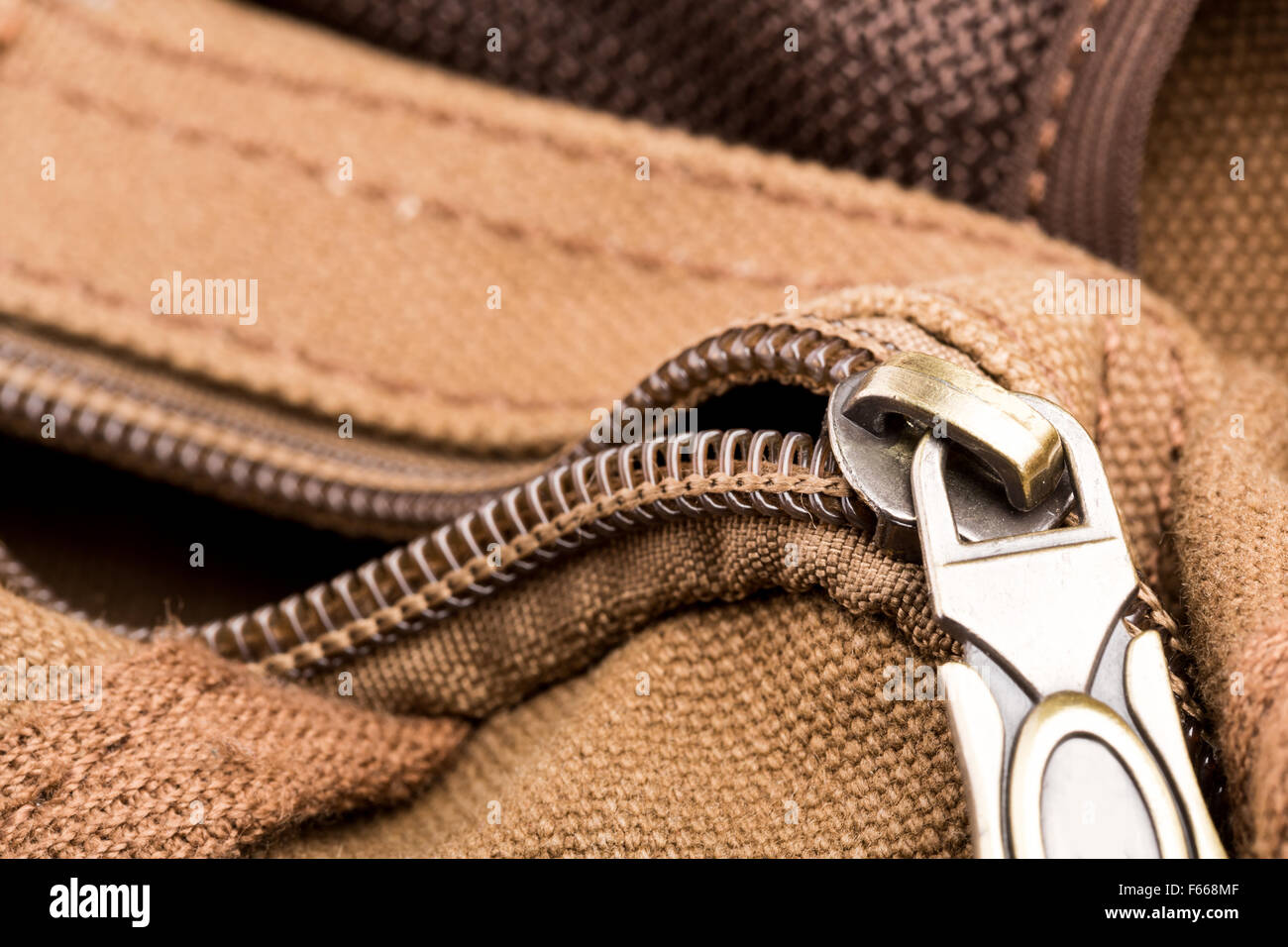 Teeth of a zip hi-res stock photography and images - Alamy