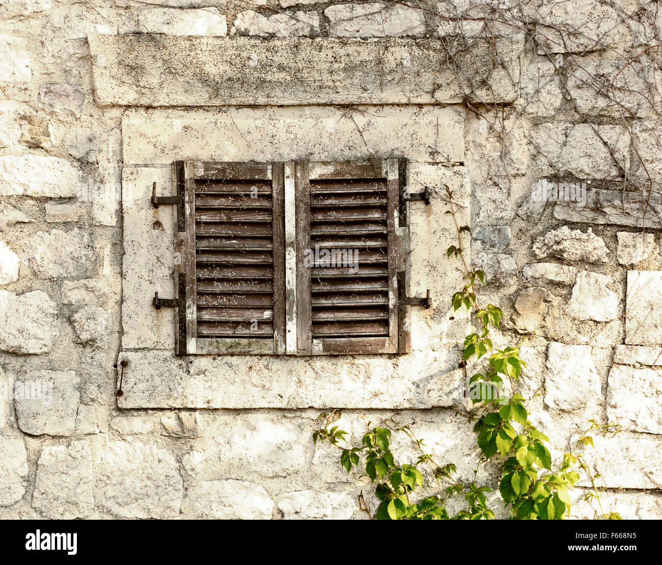 Old stone wall with window Stock Photo - Alamy