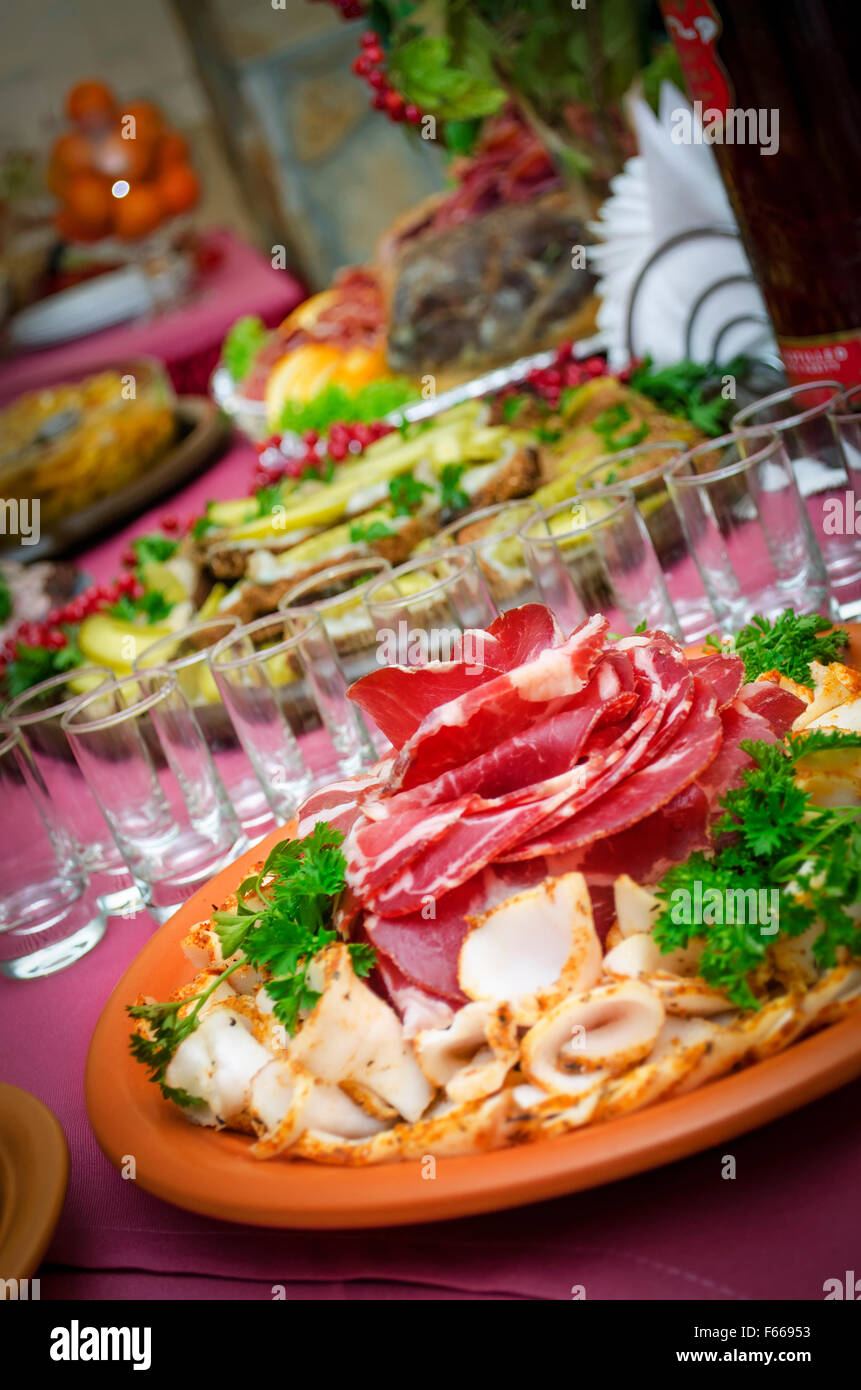 Meat on festive table Stock Photo - Alamy