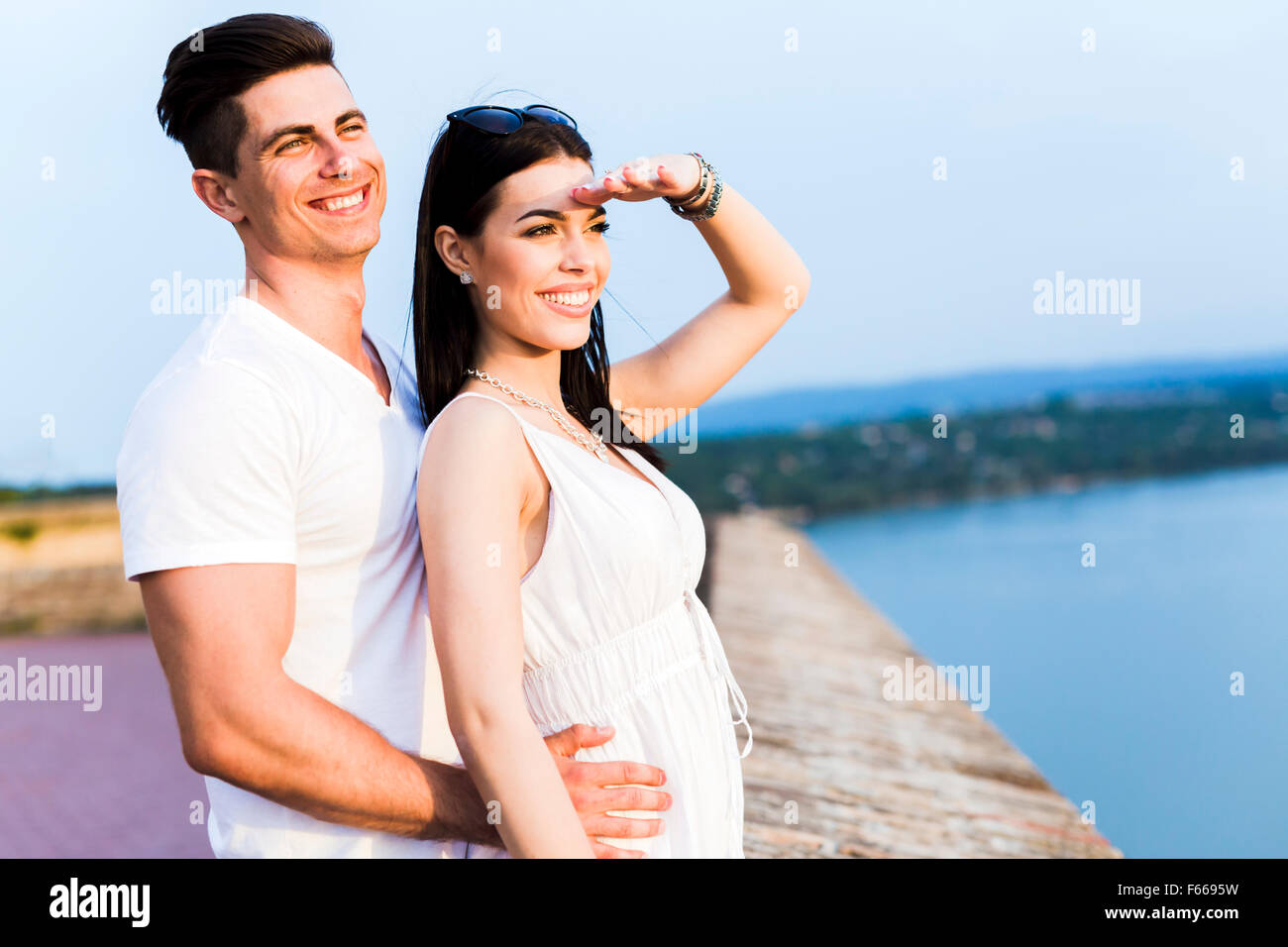 Man watching couple hugging hi-res stock photography and images - Alamy