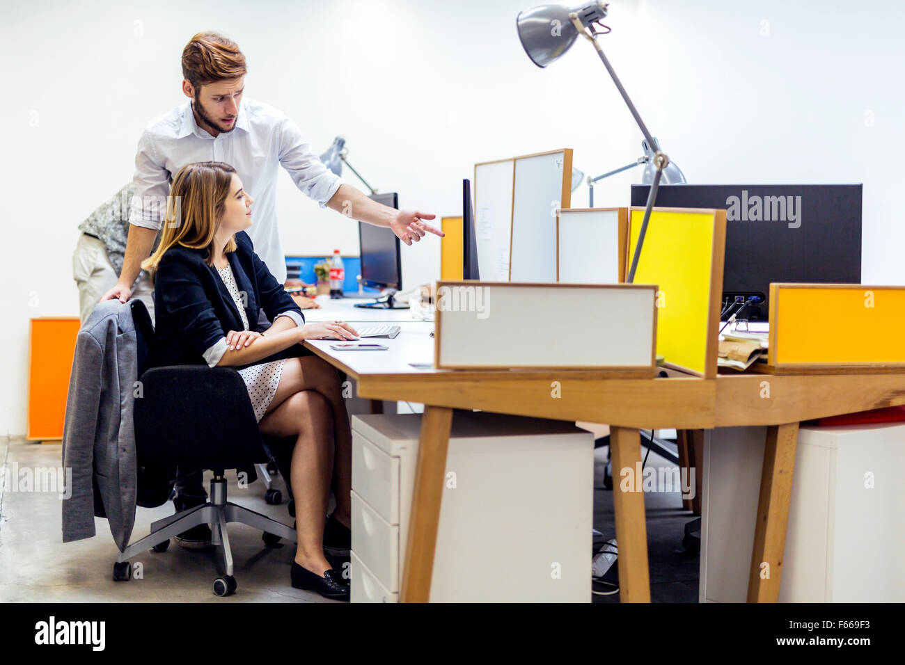 Business people in office working on a computer Stock Photo - Alamy