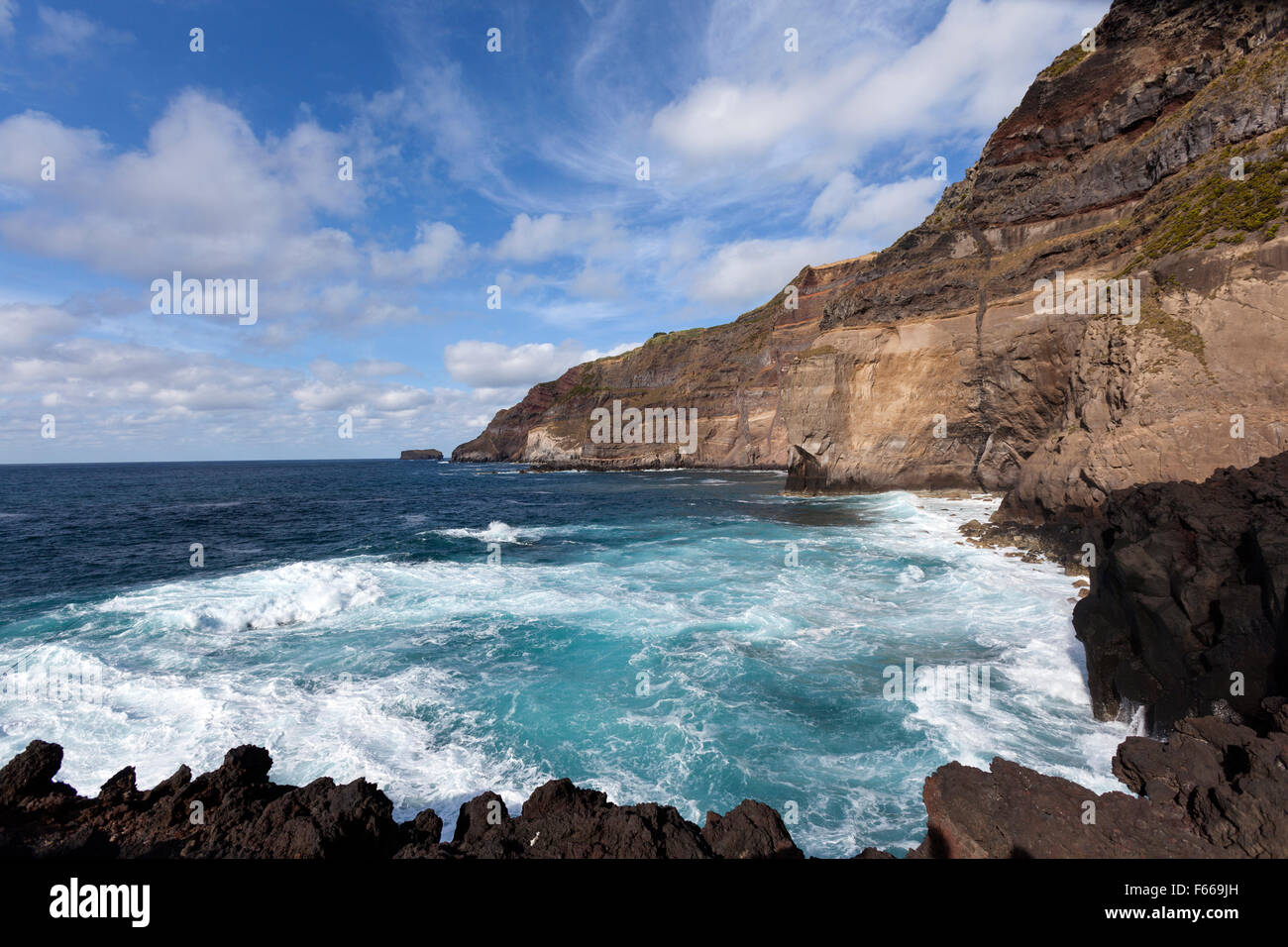 Lava rocks formation and cliffs in Termas da Ferraria, São Miguel ...