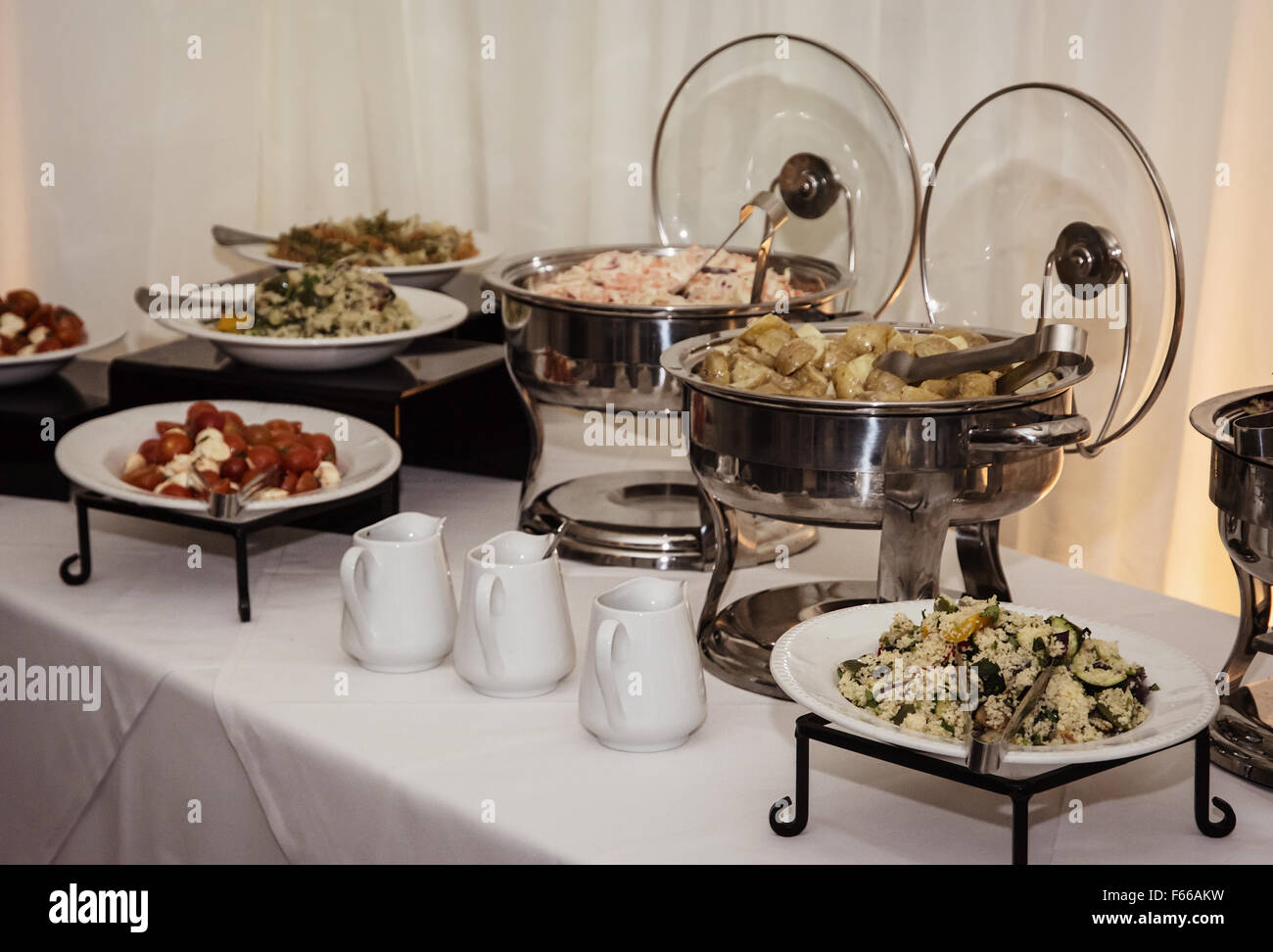 Catering boxes full of delicious food on wedding tables Stock Photo - Alamy